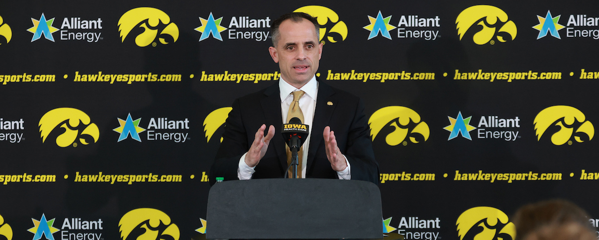 College Basketball: Iowa Hawkeye head coach Ben McCollum holds ...